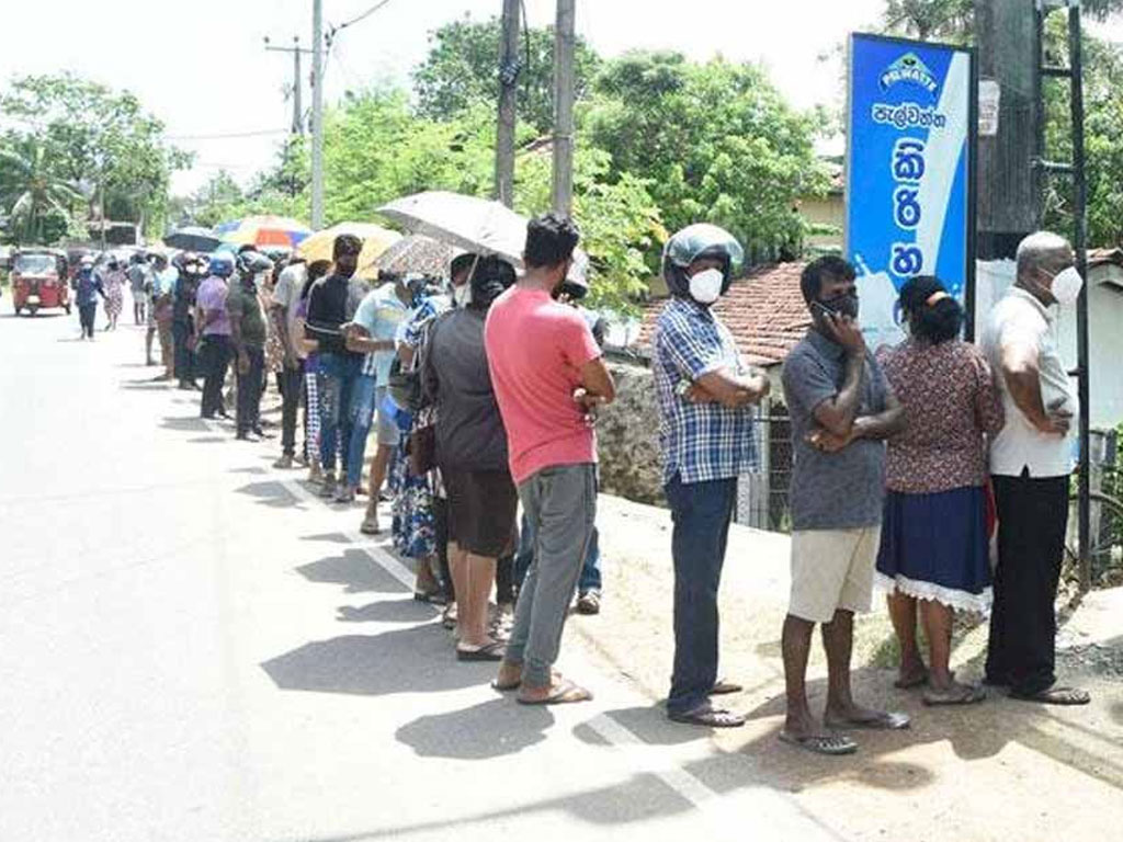 People of Mirihana continue to queue themselves for milk powder despite ...